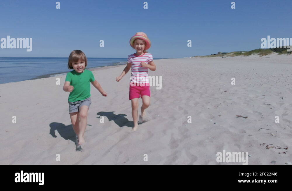 Aerial. Portrait of children on beach in summer. Happy children, boy ...