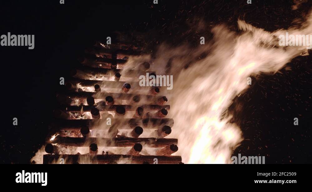 Fire flames and sparks in sacrificial fire. slow motion isolated on ...