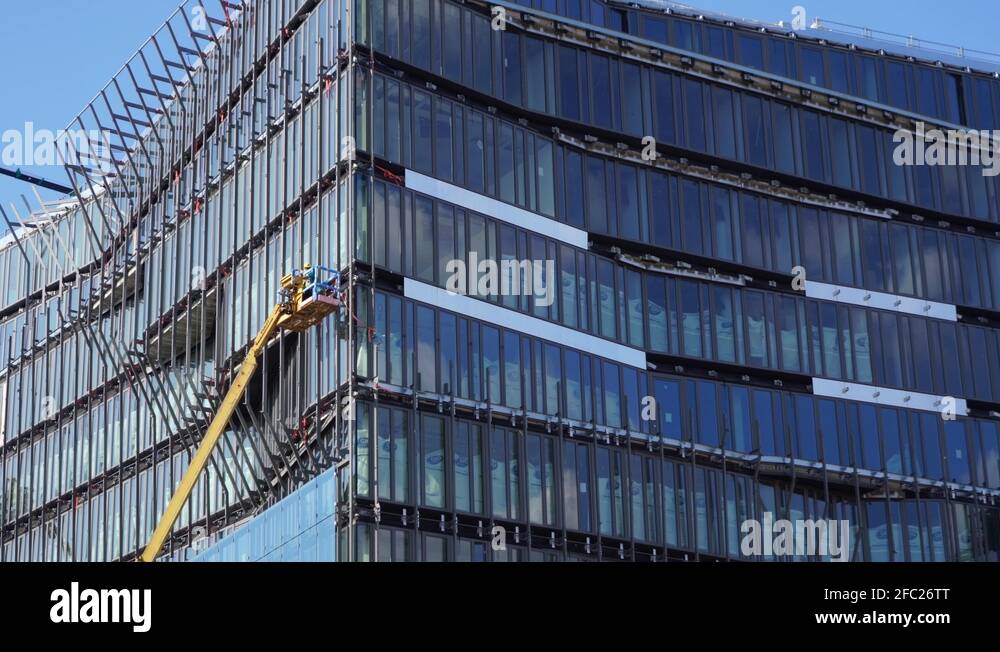 Worker in the side of a building Stock Videos & Footage - HD and 4K ...