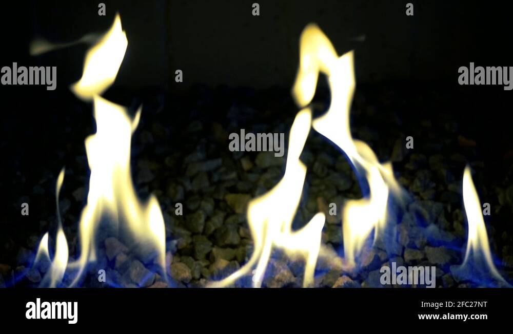 Different angles of artificial fire burning giving a modern, rusty ...