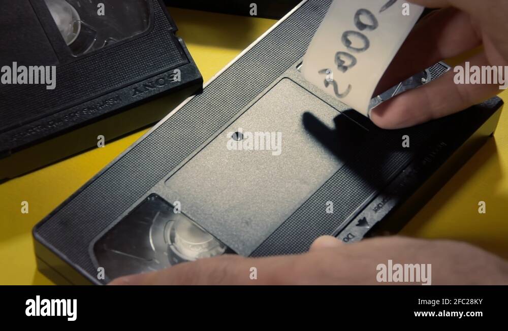 Hand applying label Stock Videos & Footage - HD and 4K Video Clips - Alamy