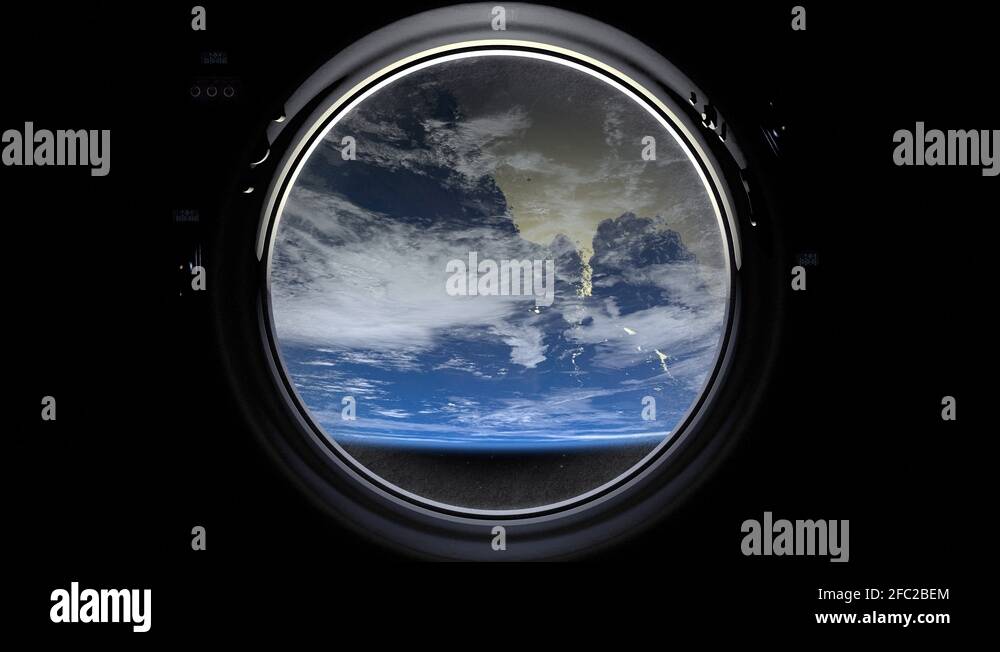Earth through the porthole window of spaceship. International space ...