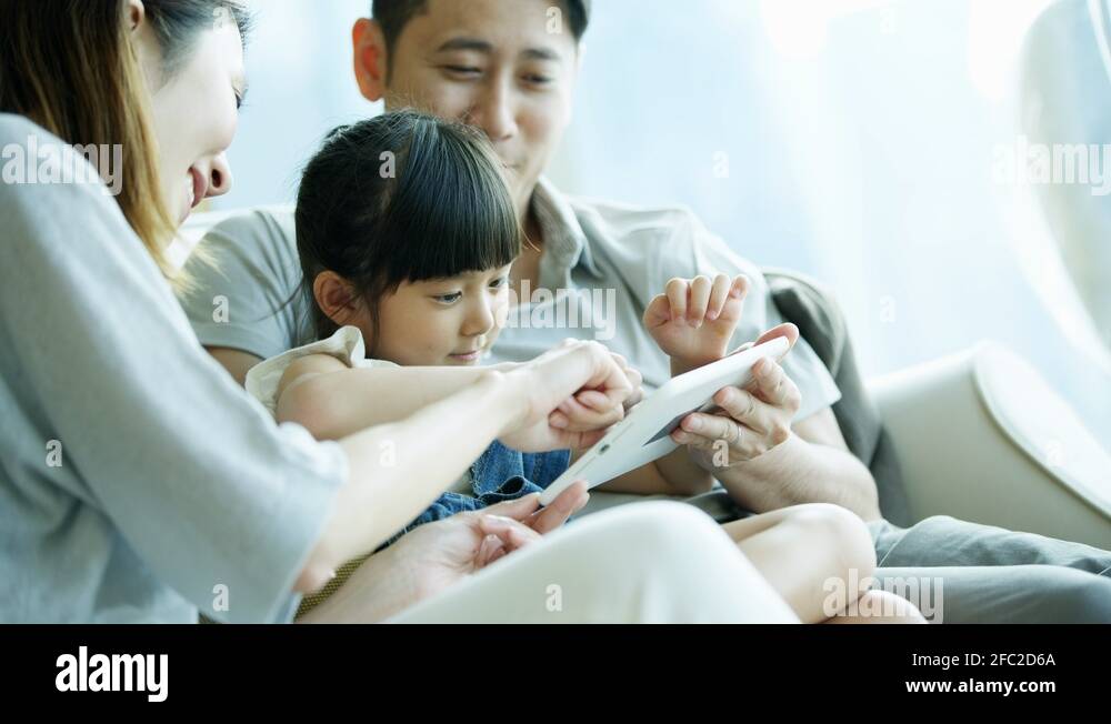 Chinese Asian mother father helping daughter school work Stock Video ... Chinese Asian mother father helping daughter school work Stock Video ...