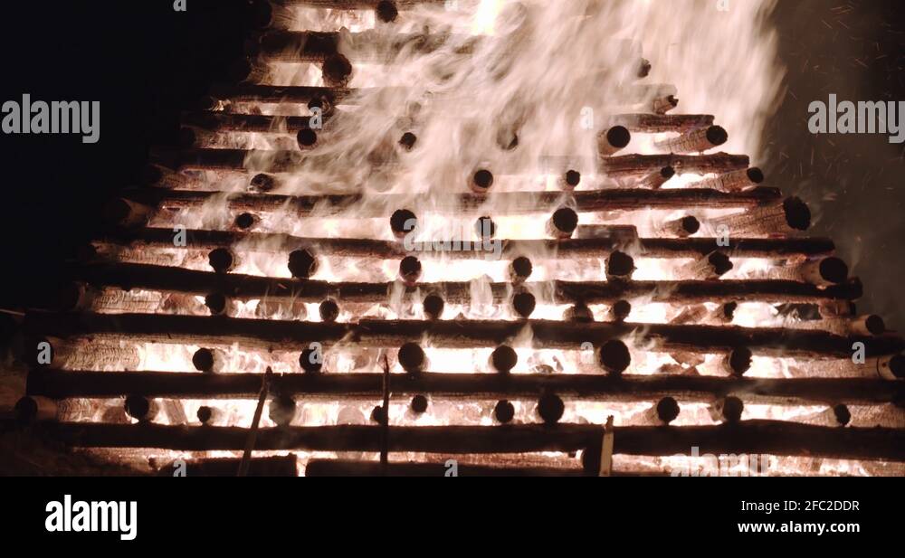 Fire flames and sparks in sacrificial fire. slow motion isolated on ...