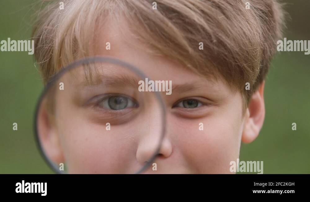 Kid looking magnifying glass Stock Videos & Footage - HD and 4K Video ...