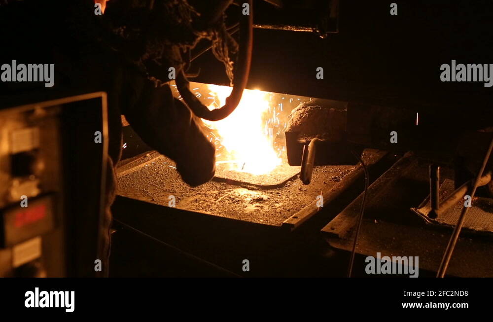 Melting of metal in a steel plant. High temperature in the melting ...