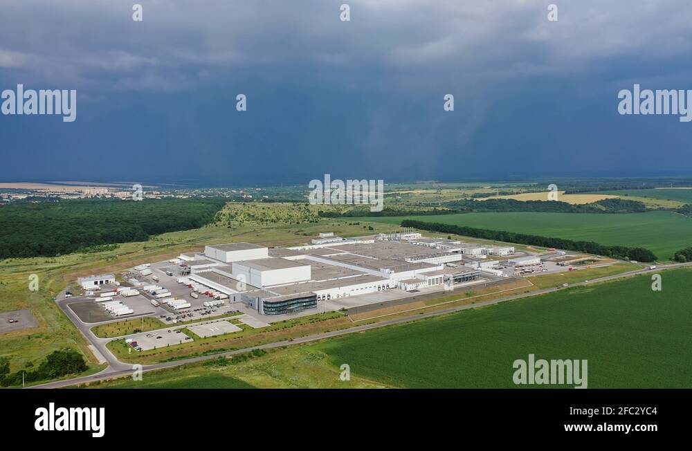 Birds-eye view to the modern industrial buildings. Large manufacturing ...