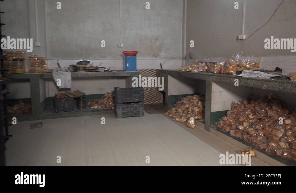 Shot of a room full of packed and labeled bread.Production ready for ...