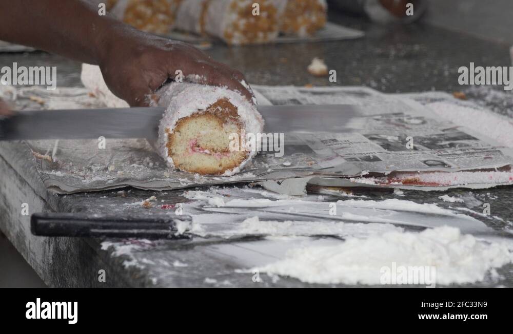Cut roll cake Stock Videos & Footage - HD and 4K Video Clips - Alamy