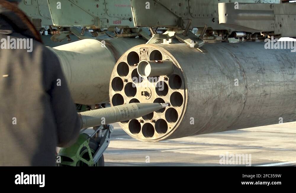 Sukhoi Su-25 (Nato Name: Frogfoot). Specialist installs unguided ...