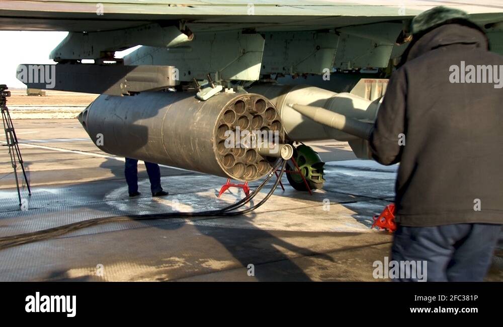 Sukhoi Su-25 (Nato Name: Frogfoot). Specialist installs rocket in ...