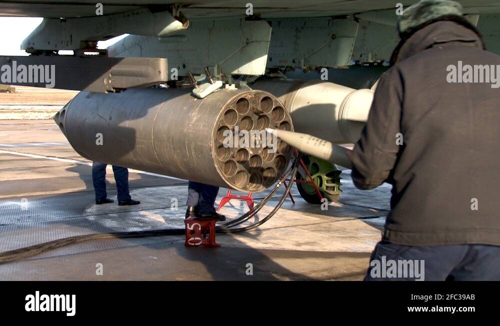Sukhoi Su-25 Nato Name: Frogfoot. Specialist installs rocket in ...
