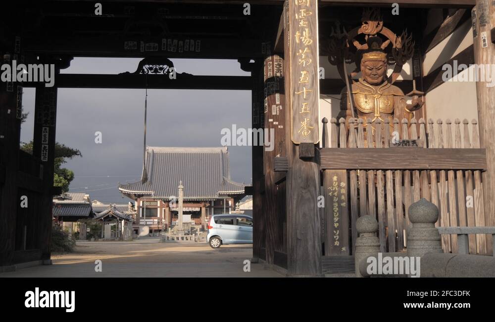 Entrance gate to Nankobo temple with statue,Imabari,Shikoku,Japan Stock ...