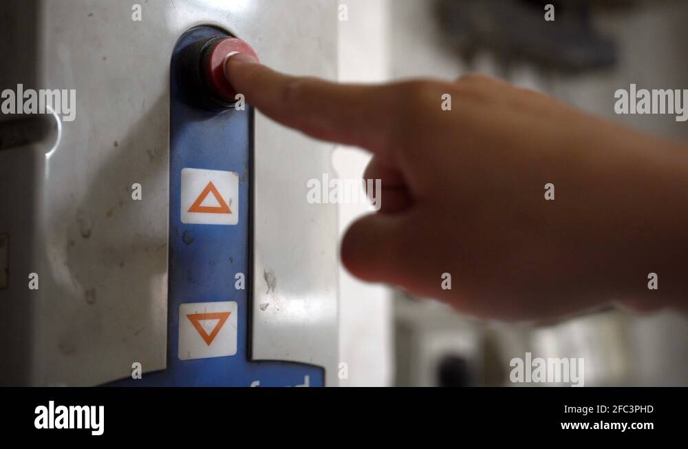 Pressing buttons on old dashboard with up, down, and circled red ...
