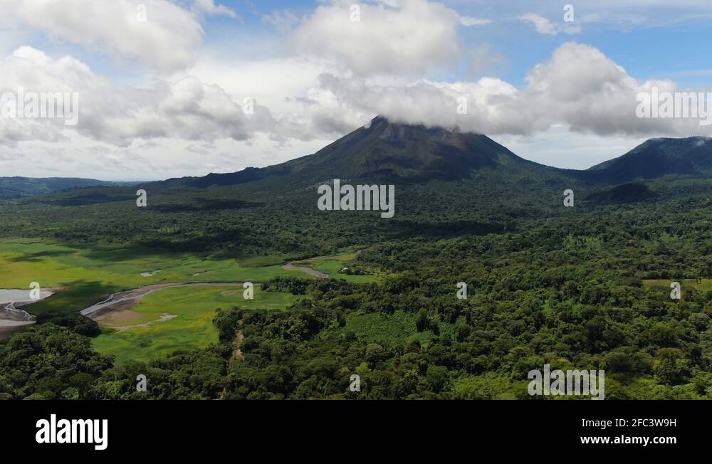 Jungles of Costa Rica aerial view with Arenal Volcano background 4k ...
