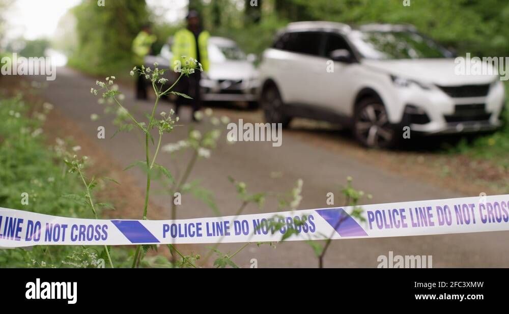 4K Uniformed police officers attending crime scene & investigating a ...