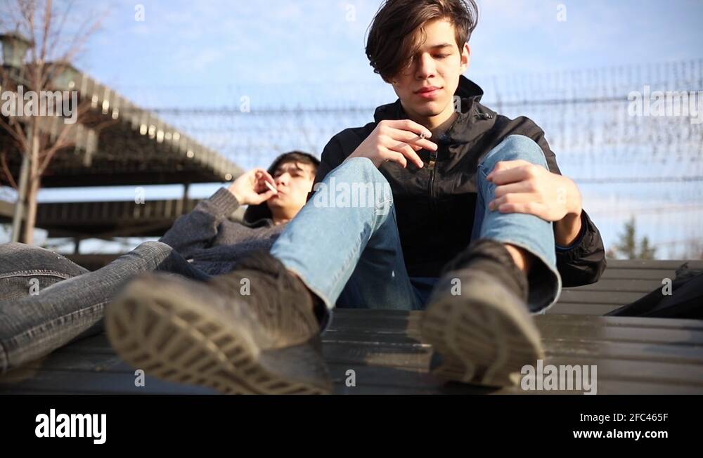 Smoking bench Stock Videos & Footage - HD and 4K Video Clips - Alamy