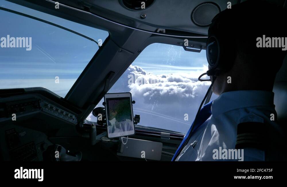 Pilot in uniform flying aircraft Stock Videos & Footage - HD and 4K ...