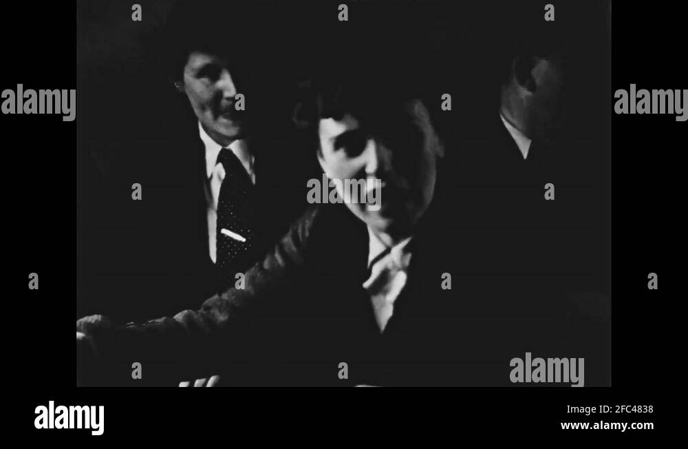 WW2 - Eva Braun and Dr. Theodor Morell sit together Stock Video Footage ...