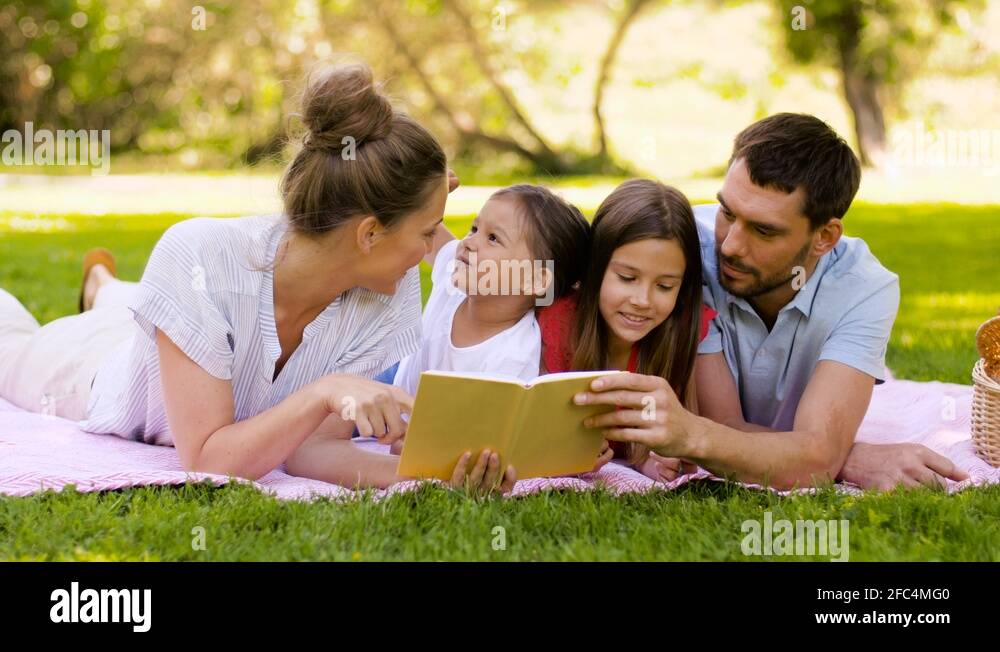 Family on picnic reading book Stock Videos & Footage - HD and 4K Video ...