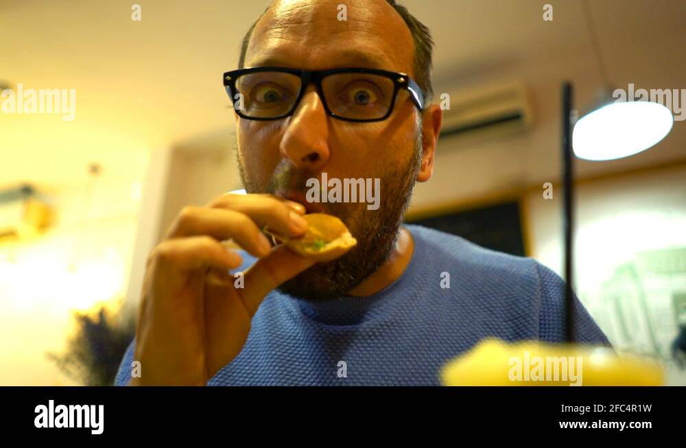 Funny man eating snack Stock Videos & Footage - HD and 4K Video Clips ...