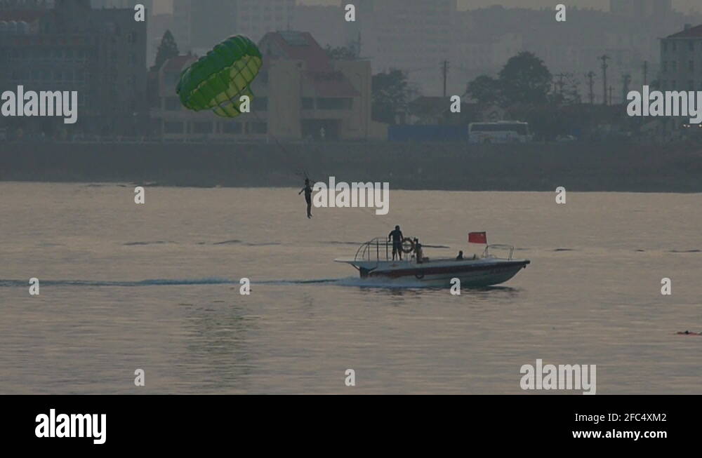 Paragliding boat Stock Videos & Footage - HD and 4K Video Clips - Alamy
