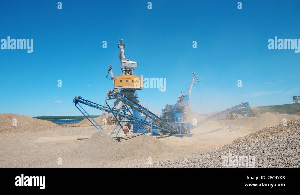 Loaders are working at the boulder quarry site Stock Video Footage - Alamy