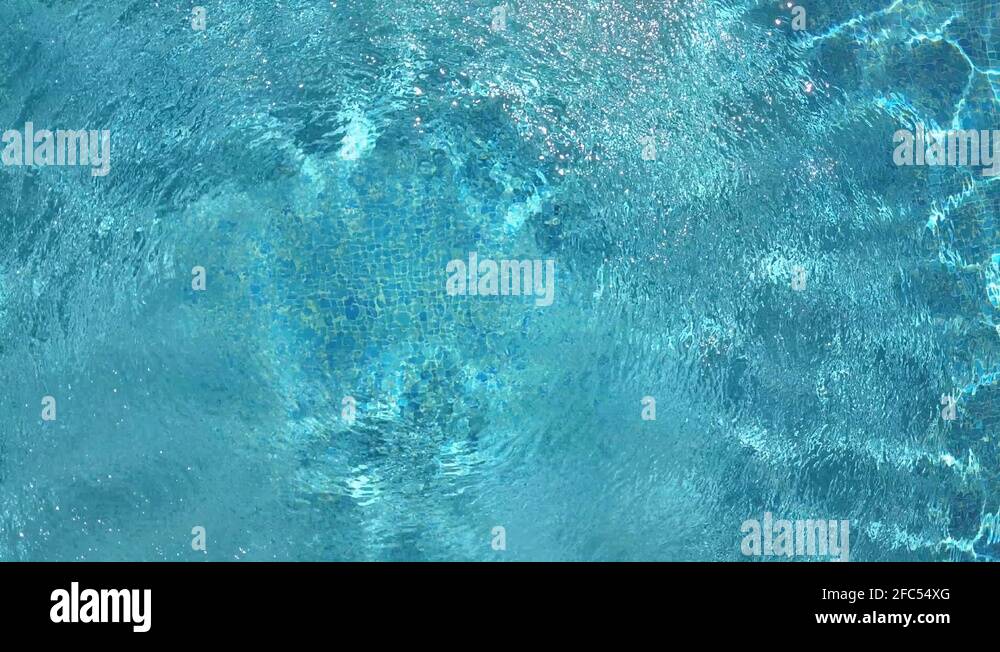 Swimming pool ripples at holiday resort in summer, birds eye view Stock ...