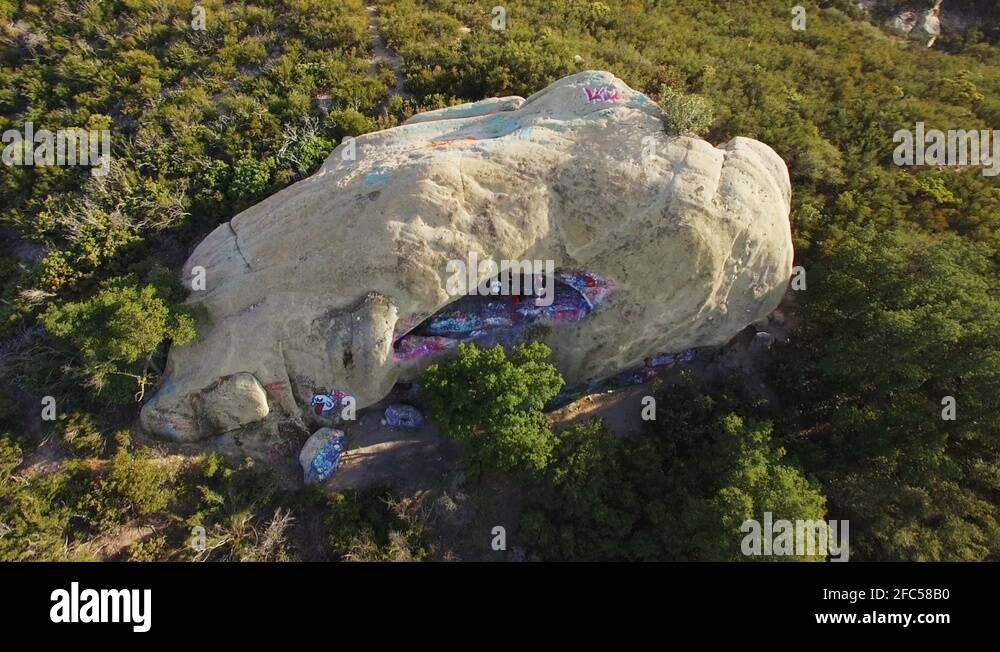 360 Aerial View of Rock Covered in Graffiti | Jim Morrison Cave in ...