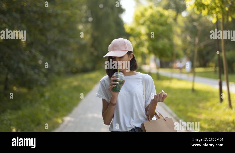 Happy female walking Stock Videos & Footage - HD and 4K Video Clips - Alamy