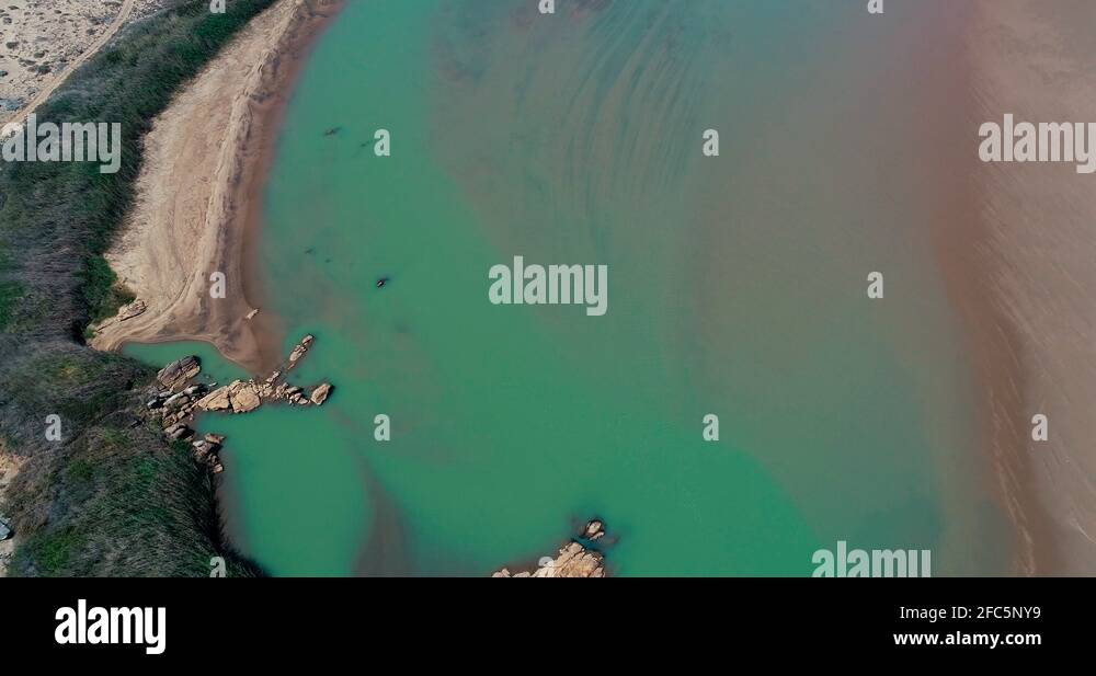 Arial birds eye view of the majestic and peaceful Kunene River on the ...