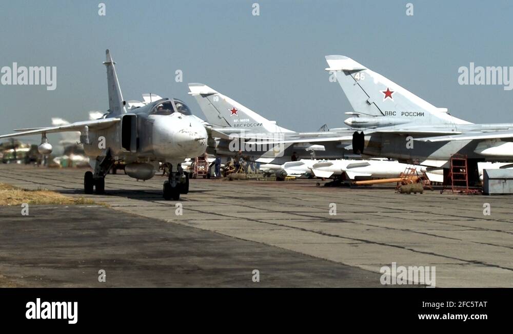 Sukhoi Su-24 Nato Name: Fencer. Aircraft Su-24 taxis behind planes ...