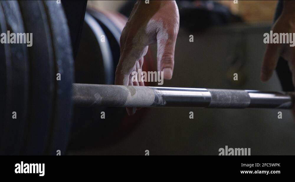 Hands grabbing deadlift bar and lifting Stock Video Footage - Alamy