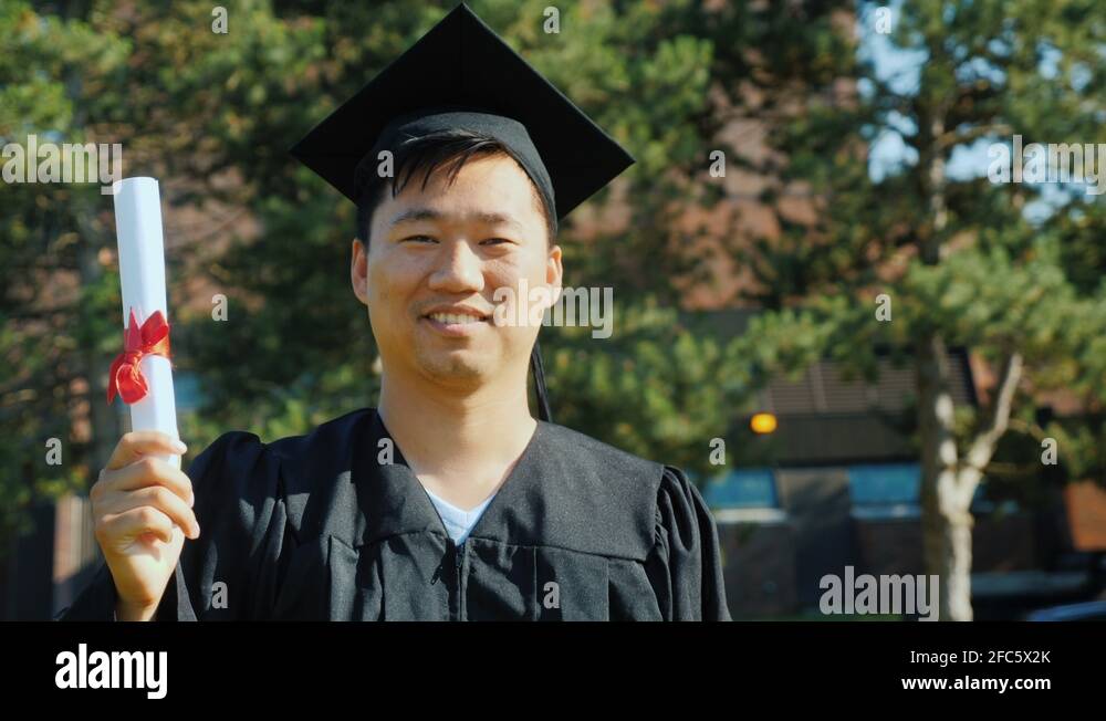 Graduation portrait Stock Videos & Footage - HD and 4K Video Clips - Alamy