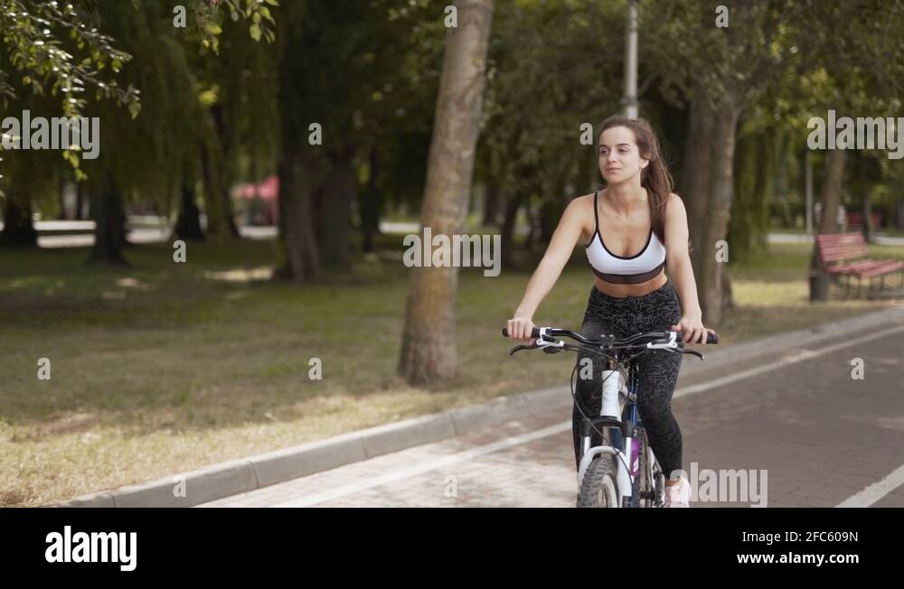 Young woman riding bike model Stock Videos & Footage - HD and 4K Video ...