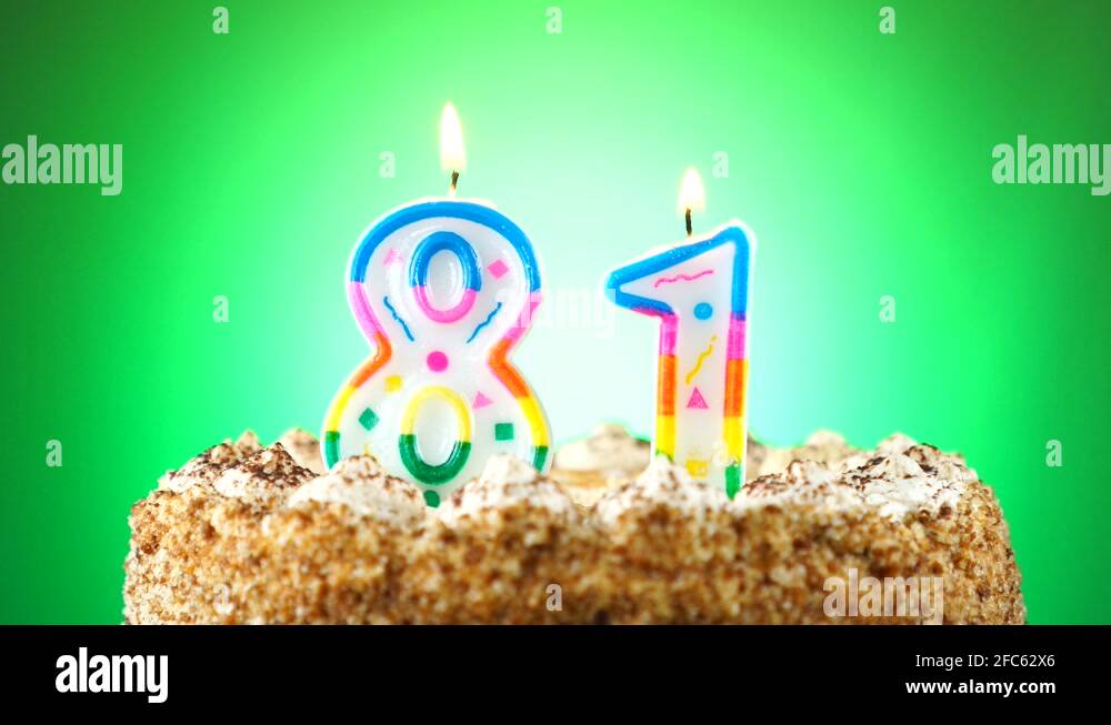Birthday cake with a burning birthday candle. Number 81. Background ...