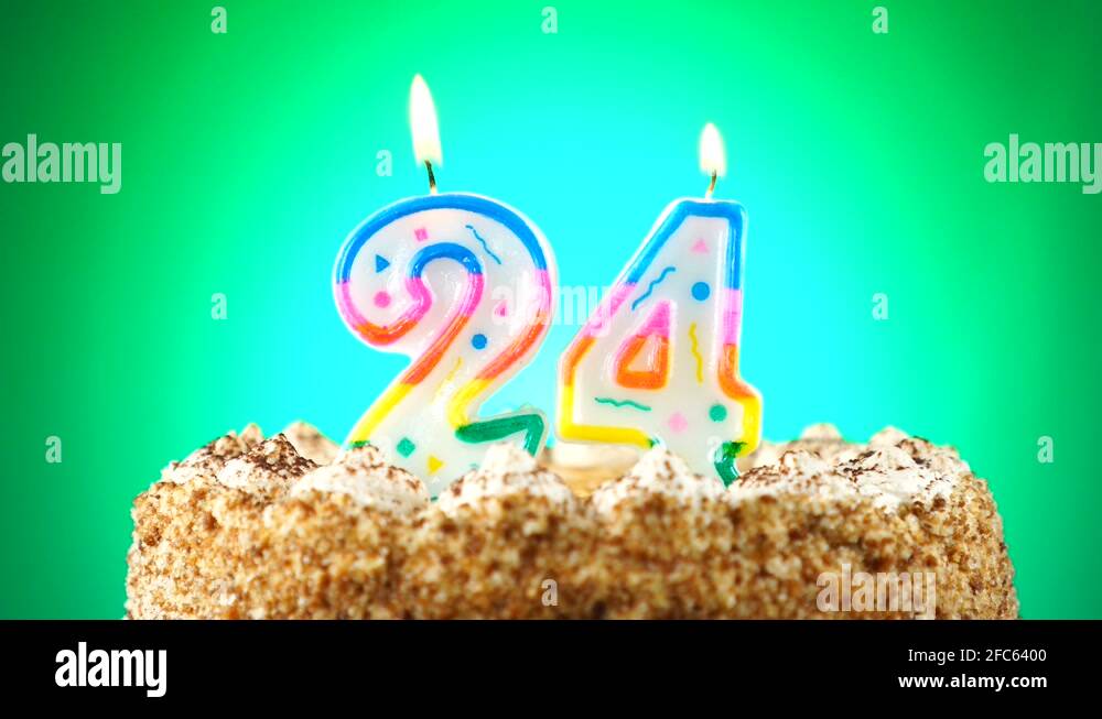 Birthday cake with a burning birthday candle. Number 24. Background ...