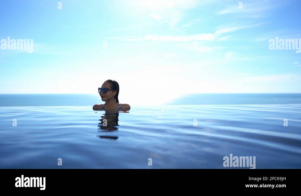 Woman in infinity pool Stock Videos & Footage - HD and 4K Video Clips ...