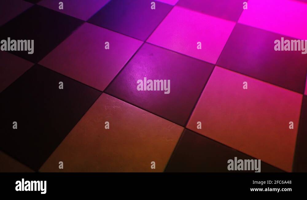 stabilized shot of an empty black and white chequered dance floor with ...