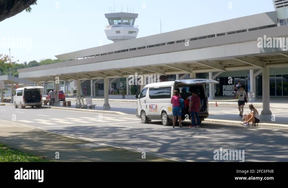 The front entrance of the main airport terminal on the island of ...