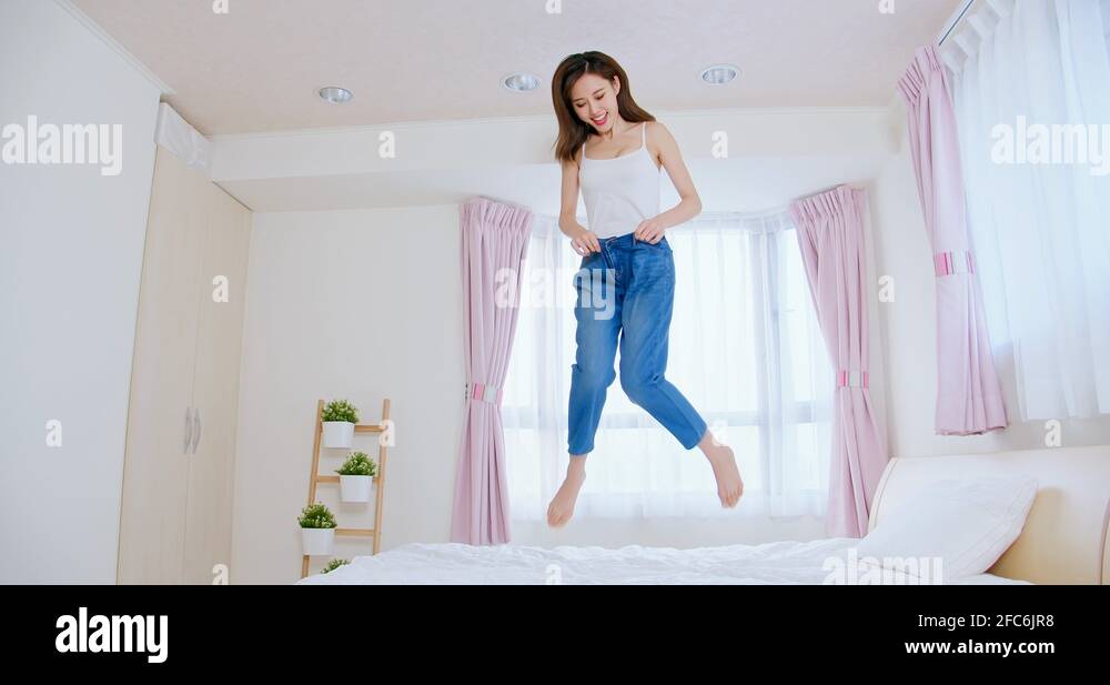 Woman jump bed Stock Videos & Footage - HD and 4K Video Clips - Alamy