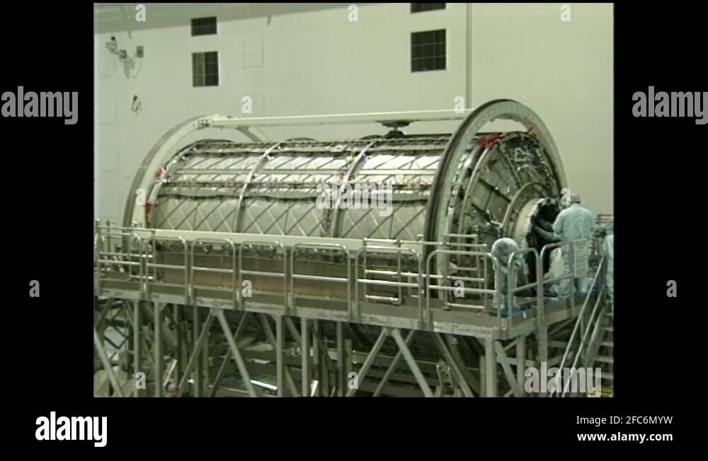 1990s: Section of Space Station inside factory warehouse. People ...