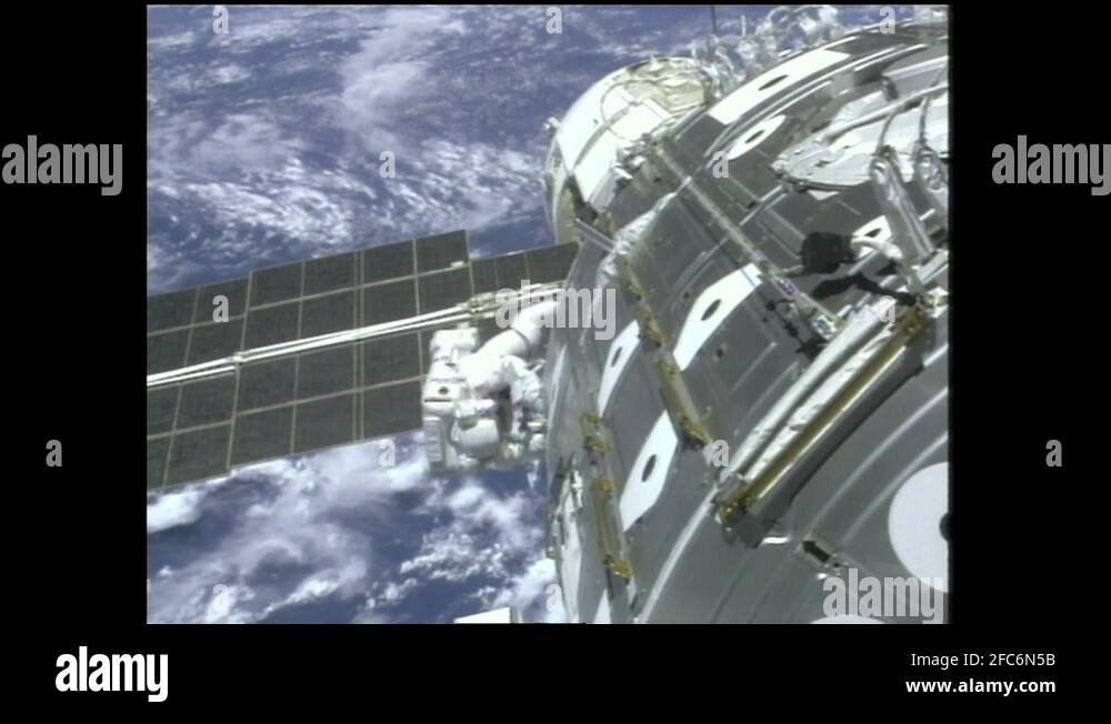 1990s: Astronaut in space suit works on outside of Space Station in ...