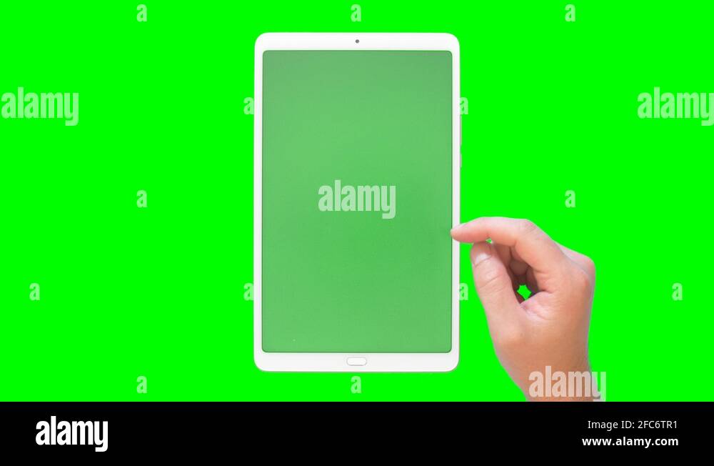 Man hands swipe on screen tablet. Top view. 4k green screen footage ...
