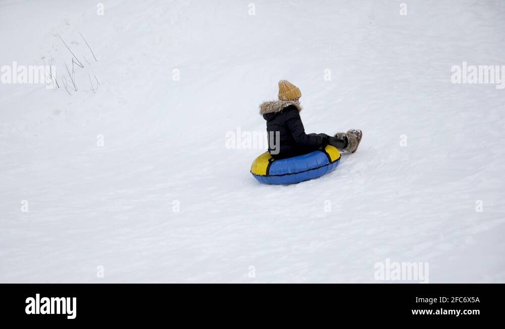 Woman sliding snow sled Stock Videos & Footage - HD and 4K Video Clips ...