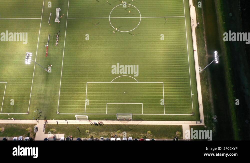 Bird Eye Aerial View of Green Illuminated Football Soccer Field With ...