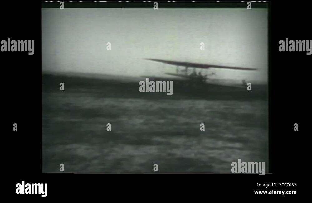 1990s: Wright Brothers plane taking flight in field. Chuck Yeager's ...