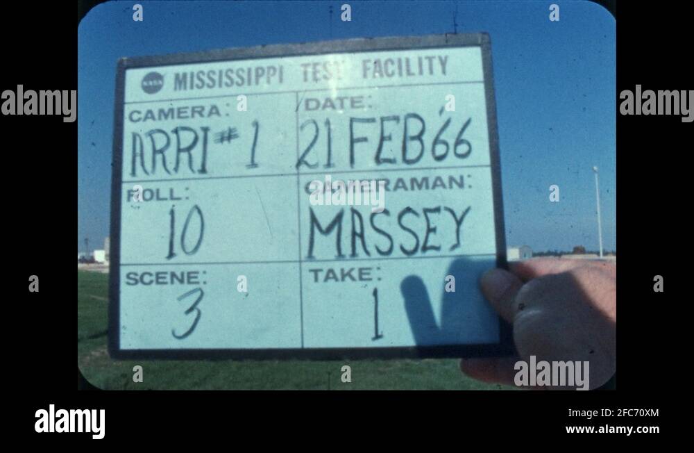 1960s: View of clapperboard. Building with cars parked outside Stock ...