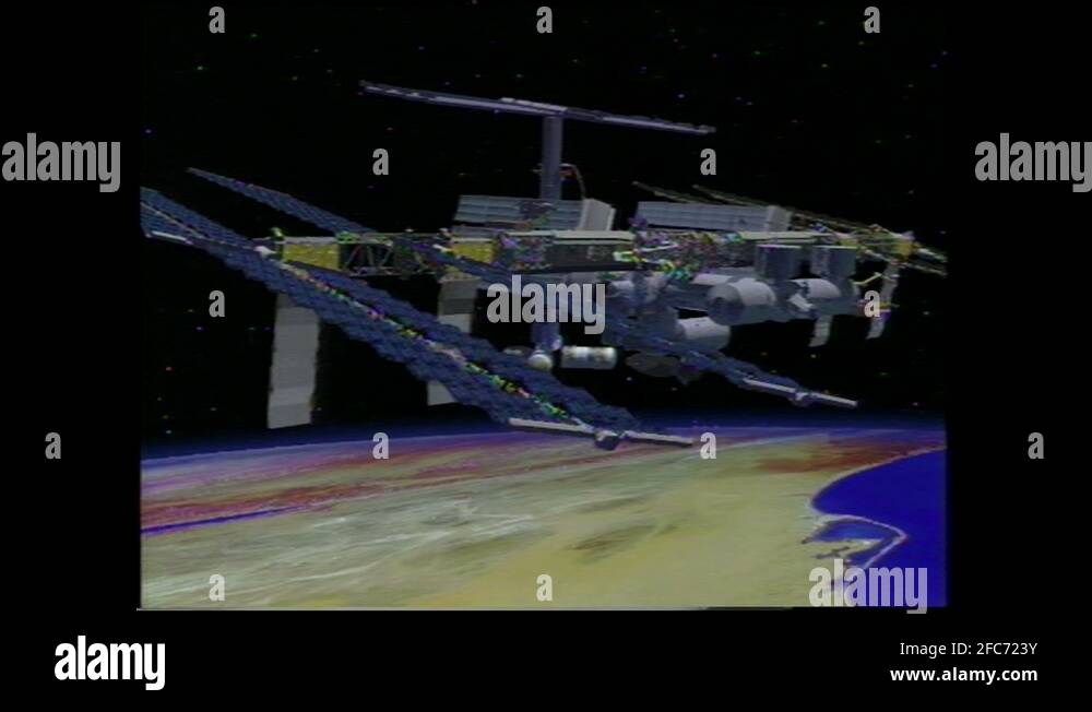 1990s: Animation. Space station in orbit. Astronauts work and eat on ...