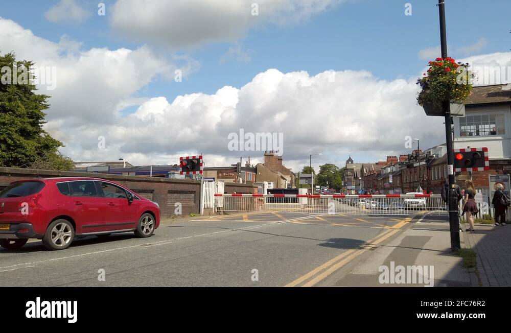 Station with a level crossing Stock Videos & Footage - HD and 4K Video ...